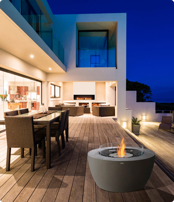 Outdoor bioethanol fireplaces EcoSmart Fire to create inviting ambience