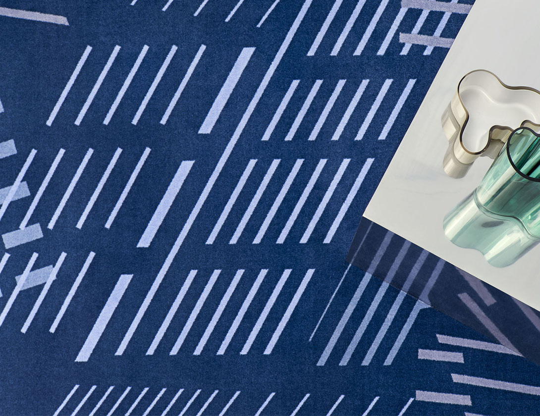 Sunlight-inspired carpeting on the wall: Ray of Light by Besana Carpet Lab