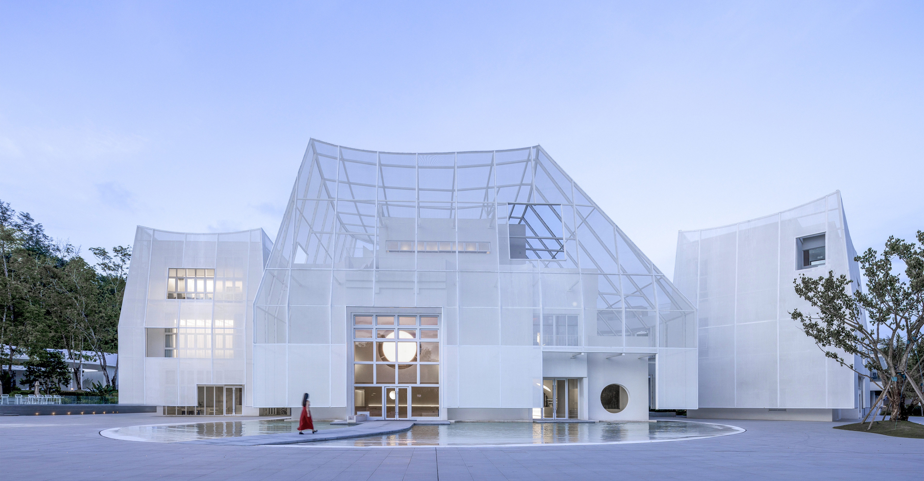 Mesh-structure membrane for textile facades: Tenseo Frontside 381 by Serge Ferrari