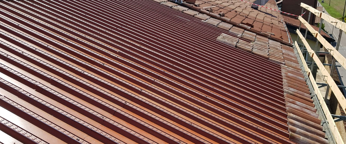 Sistema tetto per coppi con profilo isolante: SottoCoppo metallico ...